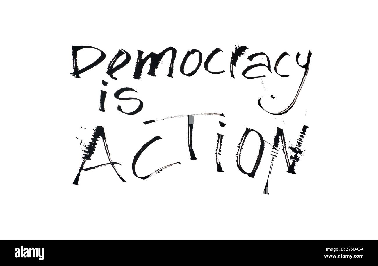 Democracy is action: inspirational calligraphy with bold black ink on ...