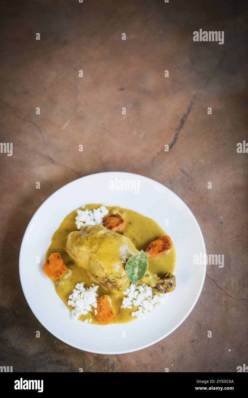 Spicy fusion chicken curry with vegetables Stock Photo - Alamy