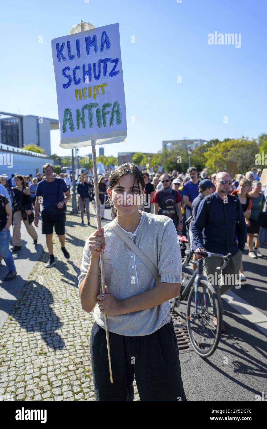 Demonstrator with sign Climate protection means Antifa at the 14th ...