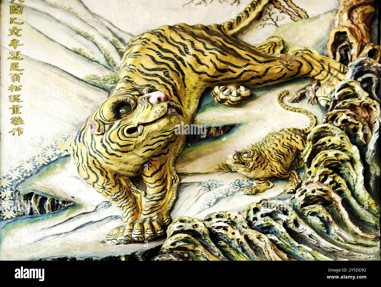 Tiger sculpture in chinese temple of penang in malaysia Stock Photo - Alamy