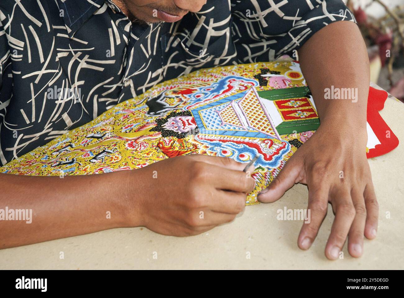 Traditional buffalo skin carving in indonesia Stock Photo - Alamy