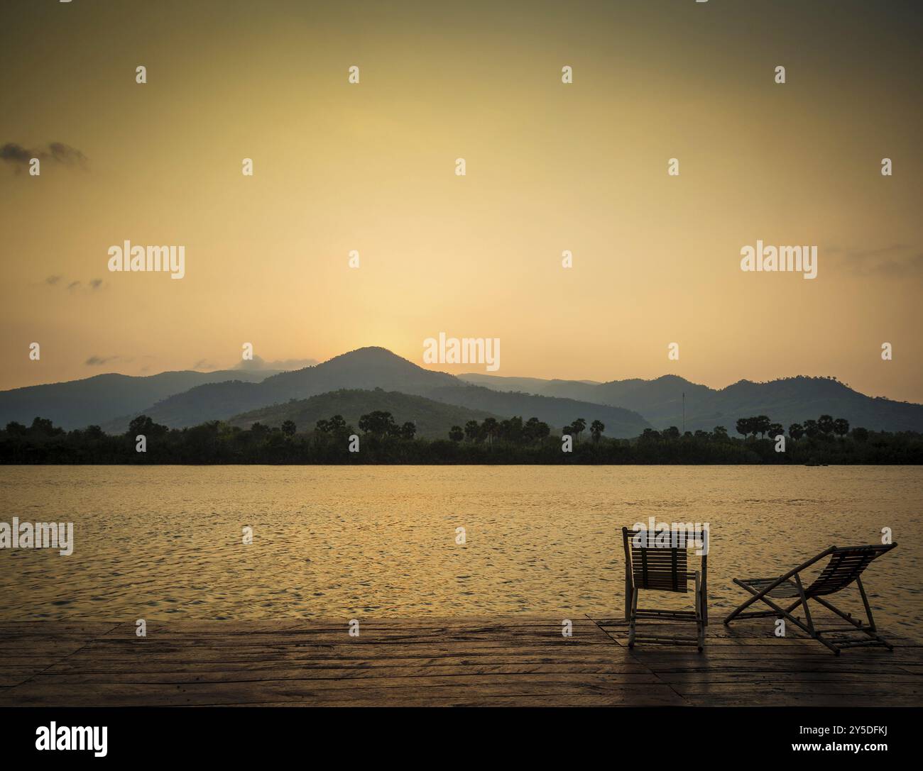 Tropical exotic sunset riverside view in kampot cambodia asia with deck ...