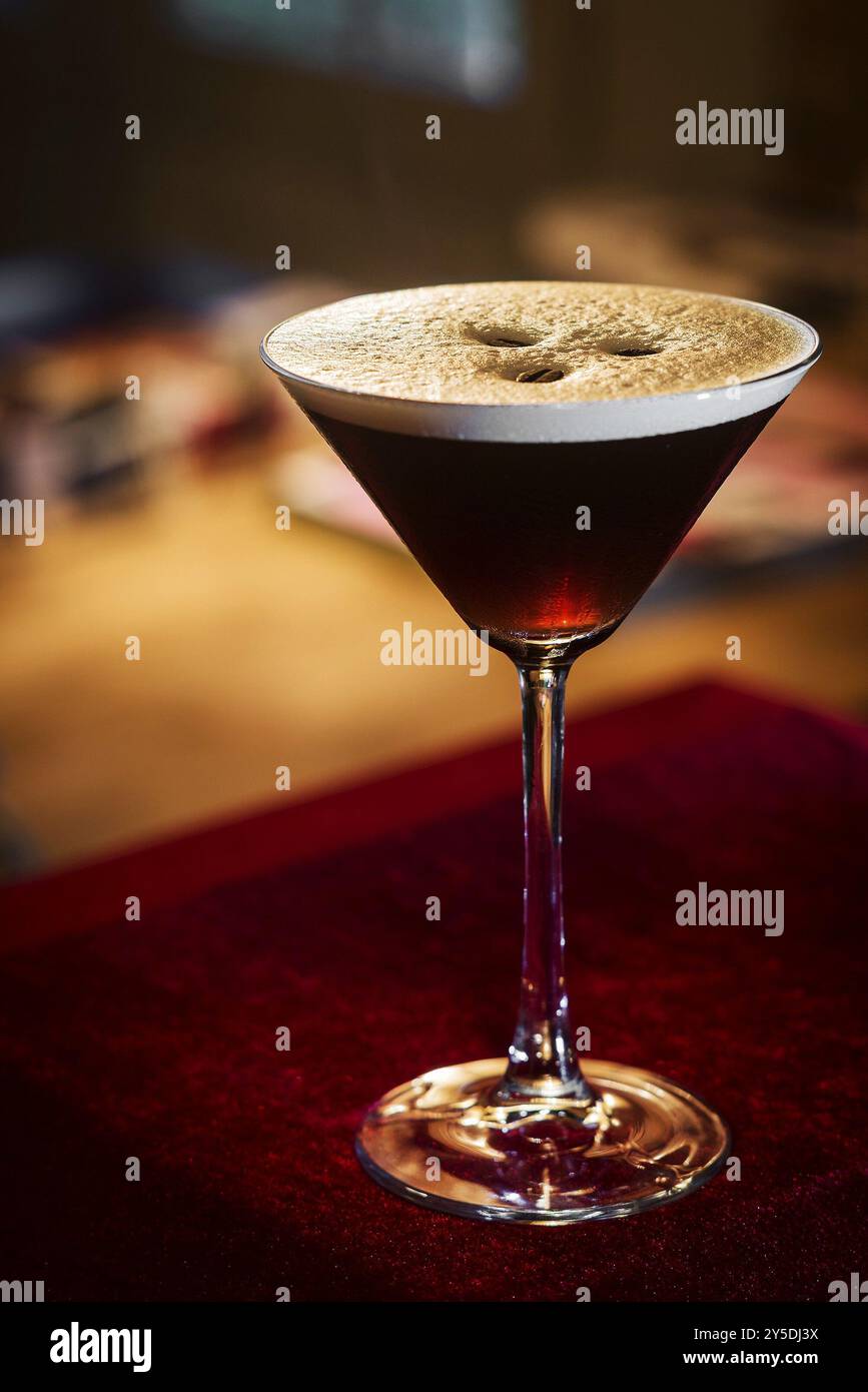 Espresso coffee martini cocktail drink in bar at night Stock Photo - Alamy