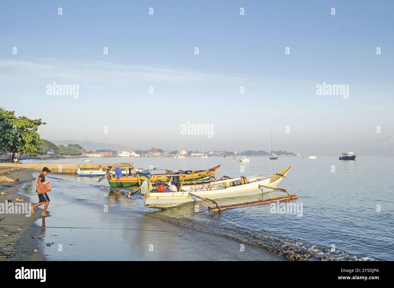 Fishing boats on beach in dili east timor, timor leste Stock Photo - Alamy