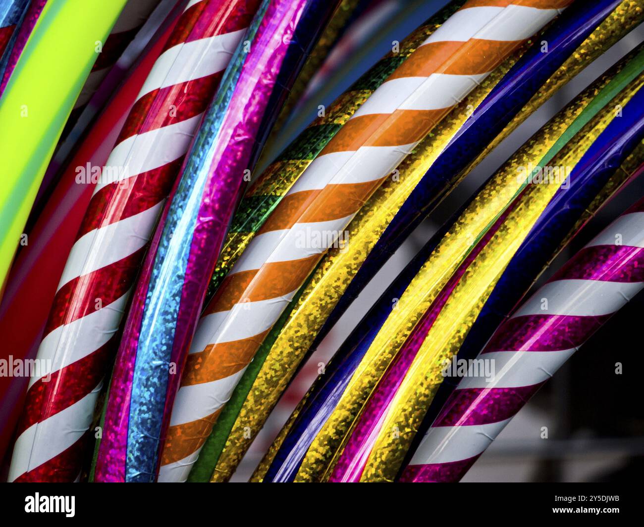 Hula hoops in different colours and patterns Stock Photo - Alamy