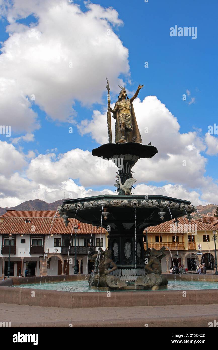 A fountain with a statue of the Inca King Pachacutec in the main square ...