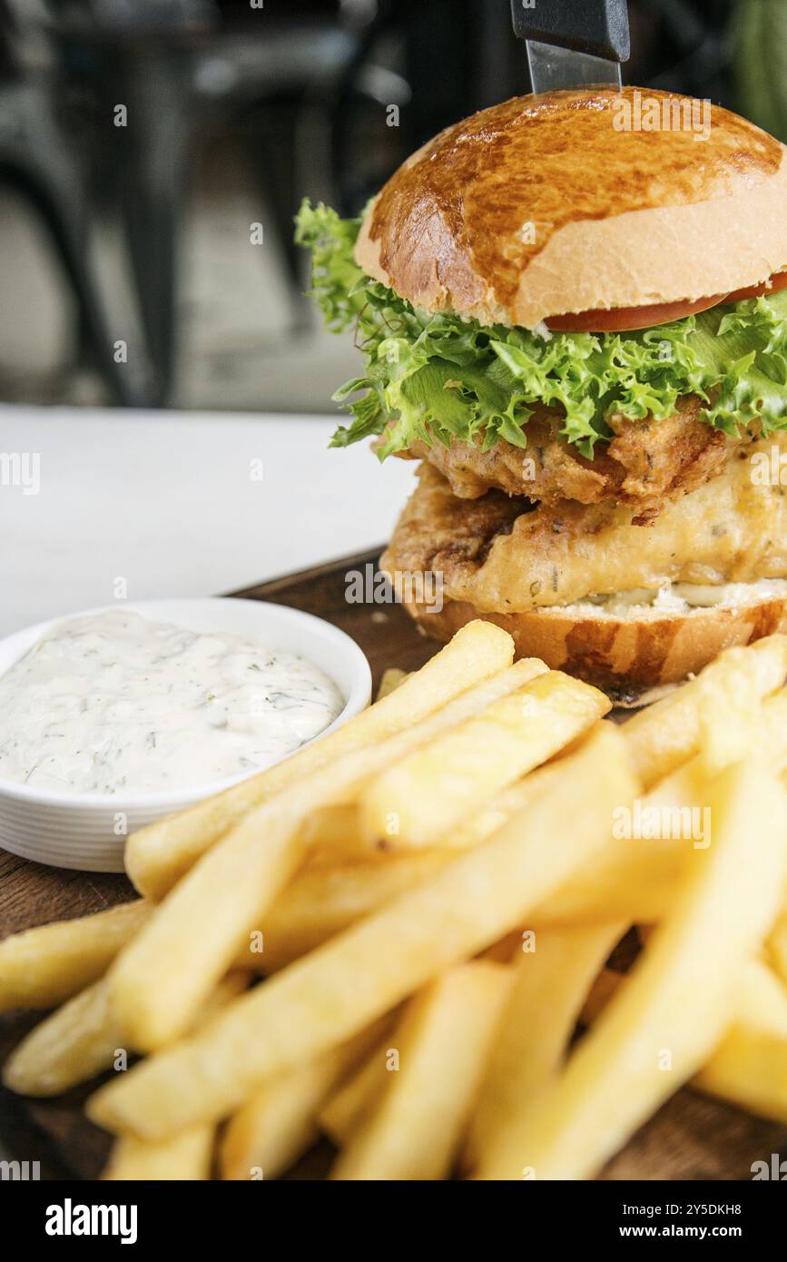 Fish fillet burger with fries and tartar sauce set snack meal Stock ...