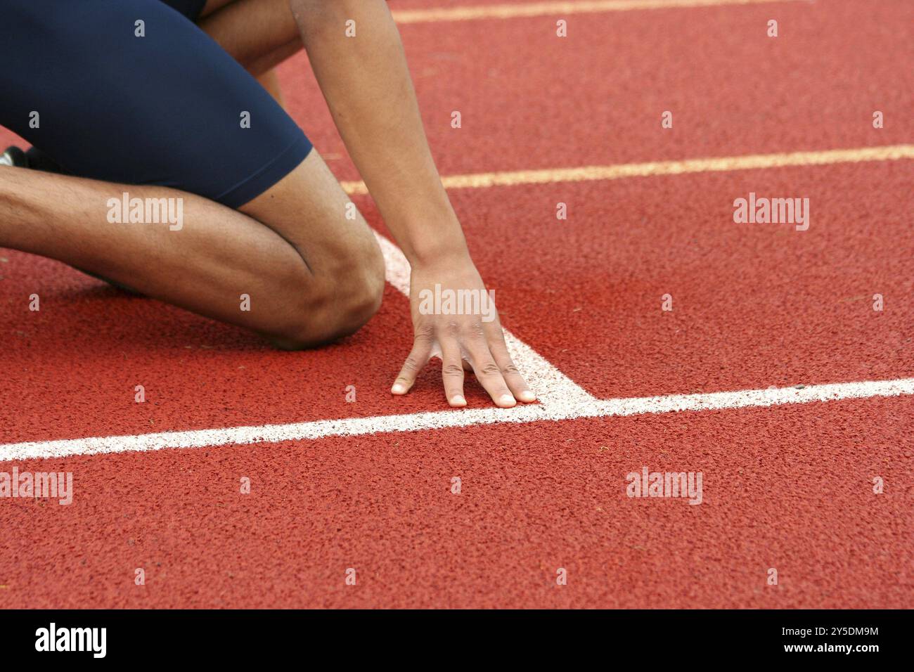 A runner on his mark Stock Photo - Alamy