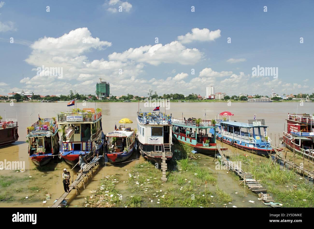 Tourist boats on tonle sap river in phnom penh cambodia Stock Photo - Alamy