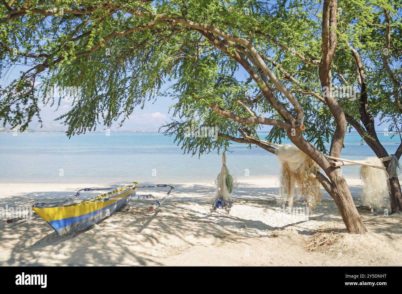 Fishing boat on beach in dili east timor, timor leste Stock Photo - Alamy