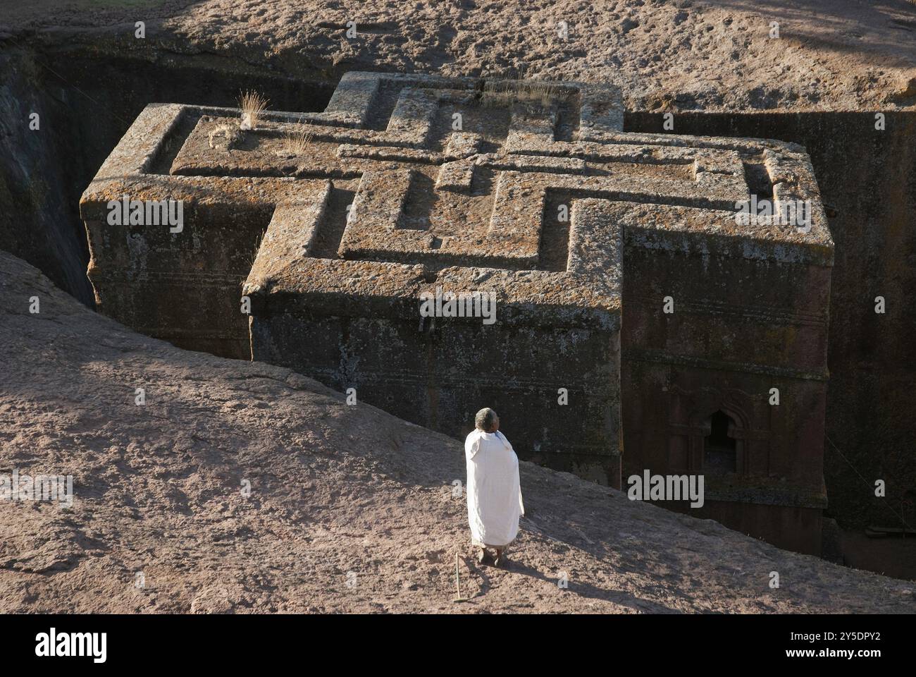 Lalibela ethiopia rock hewn church and priest Stock Photo - Alamy