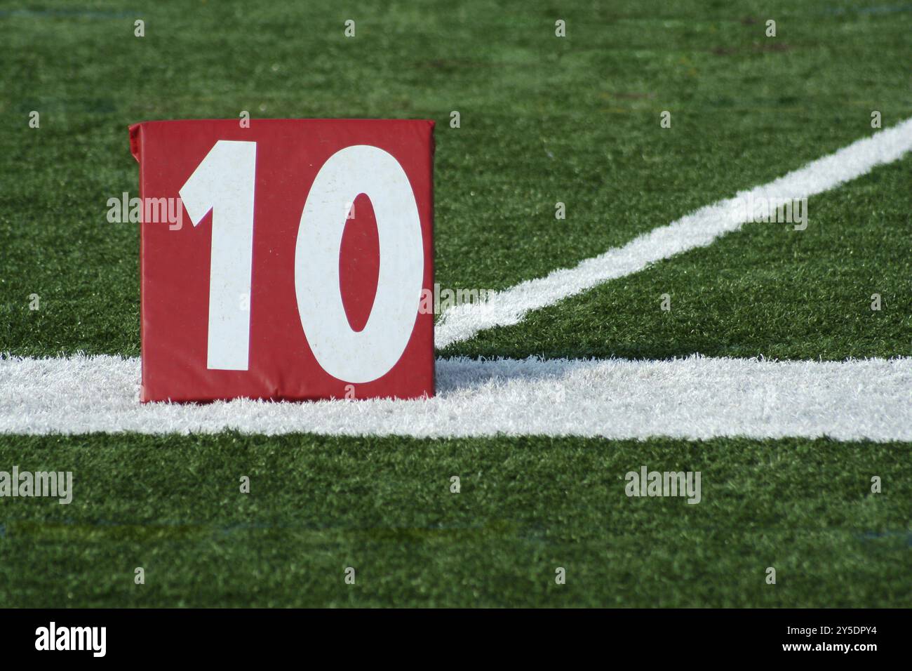 A red Football ten yard marker Stock Photo - Alamy
