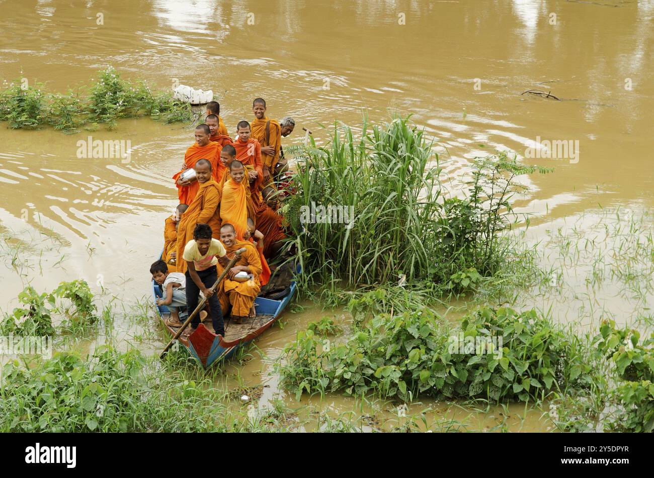 Buddhist monks crossing river in battambang cambodia Stock Photo - Alamy