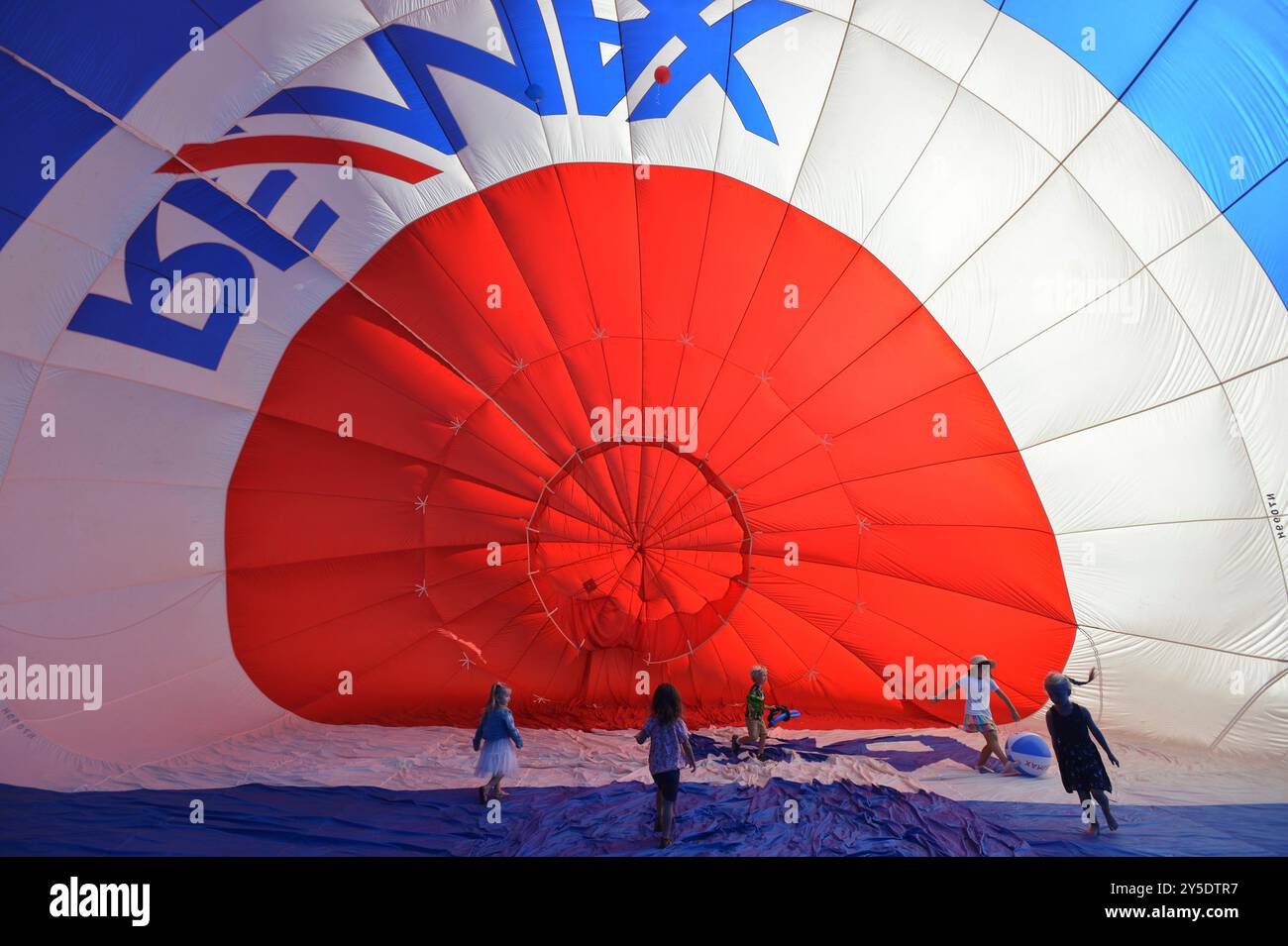 Children explore a hot air balloon during the RE/MAX by the Lake Big ...