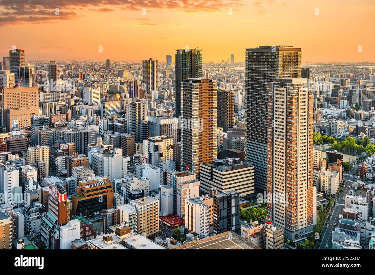 Aerial scenic view of Osaka skyline at sunset. Modern glass skyscrapers ...
