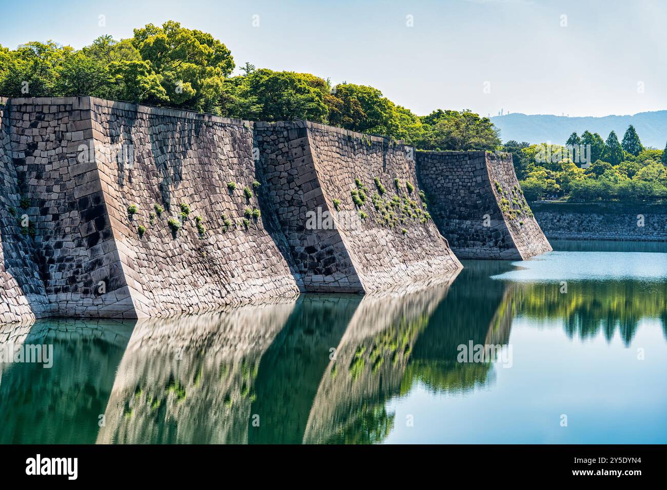 The massive stone wall outer moat of Osaka Castle, Japan Stock Photo ...
