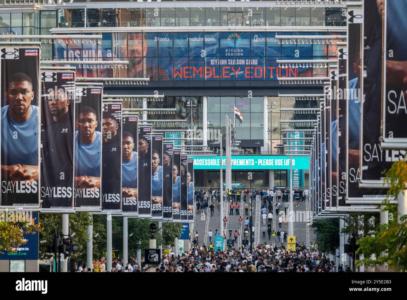 London, UK. 21 September 2024. Boxing fans arrive at Wembley Stadium ...