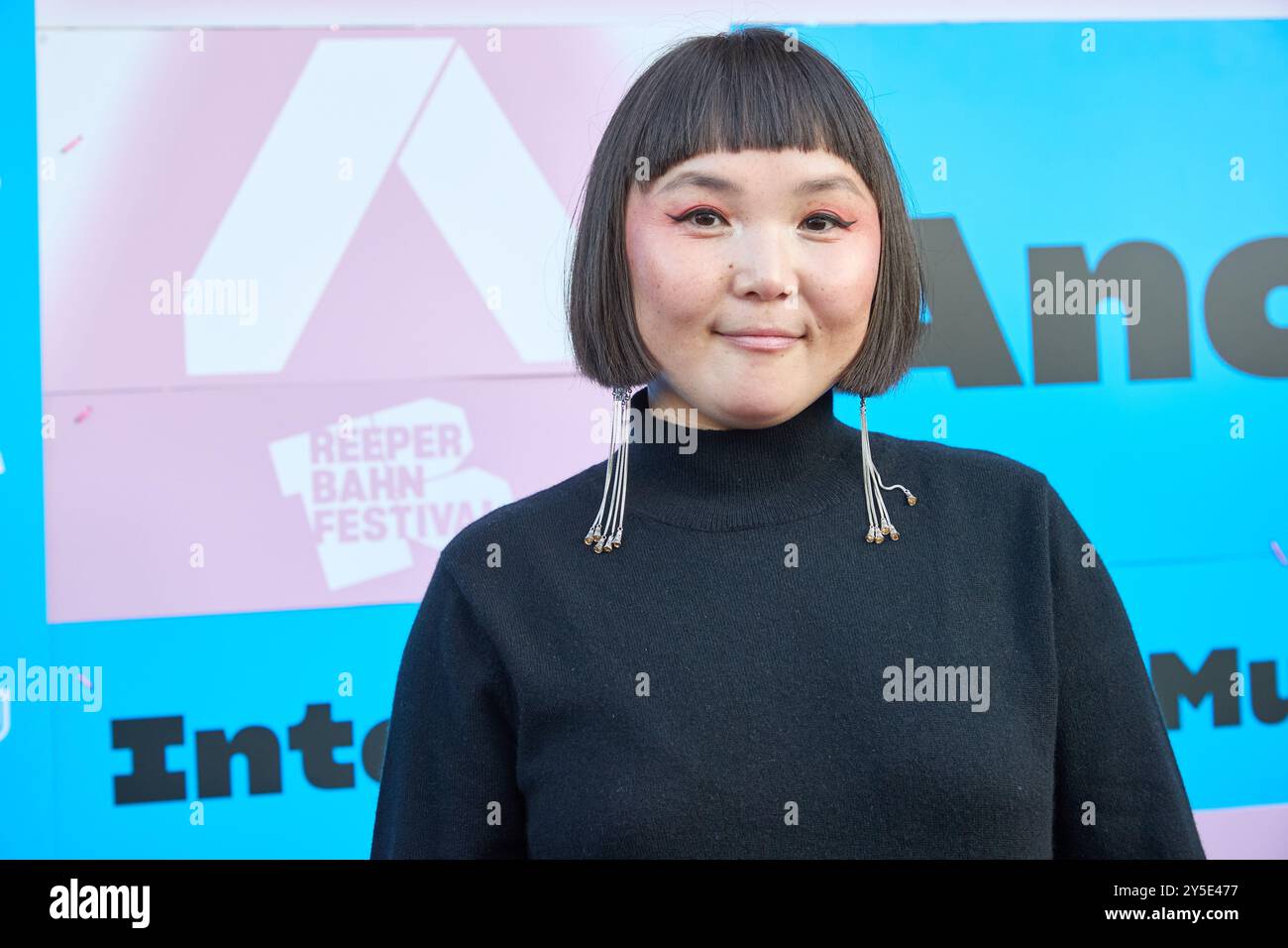 Hamburg, Germany. 21st Sep, 2024. The nominated musician Enji stands in ...