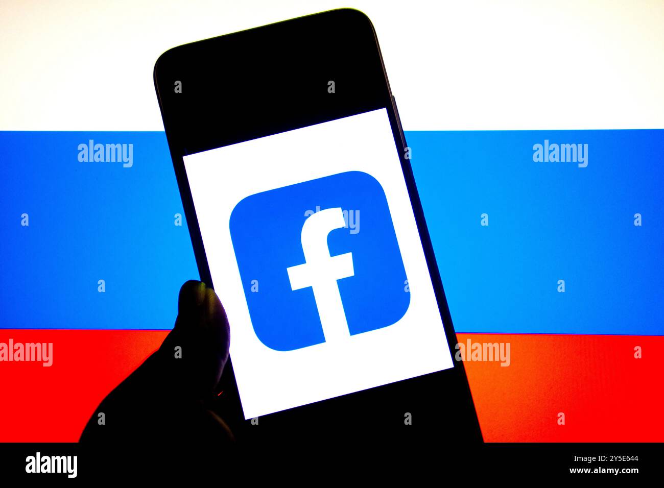 In this photo illustration, a Facebook logo seen displayed on a ...