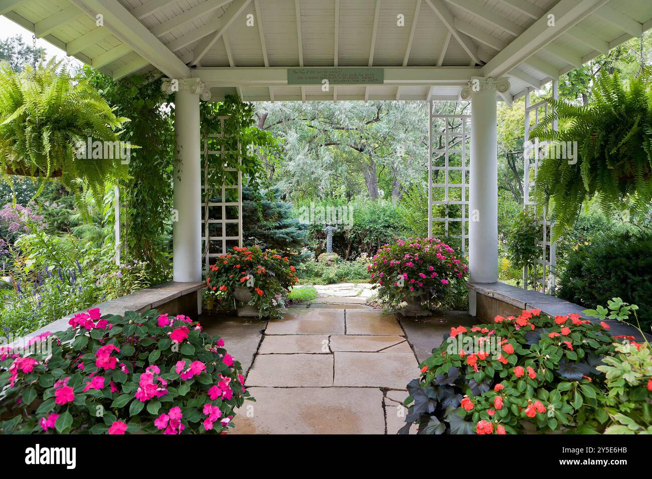 Gazebo in English style garden with a profusion of flowers Stock Photo ...