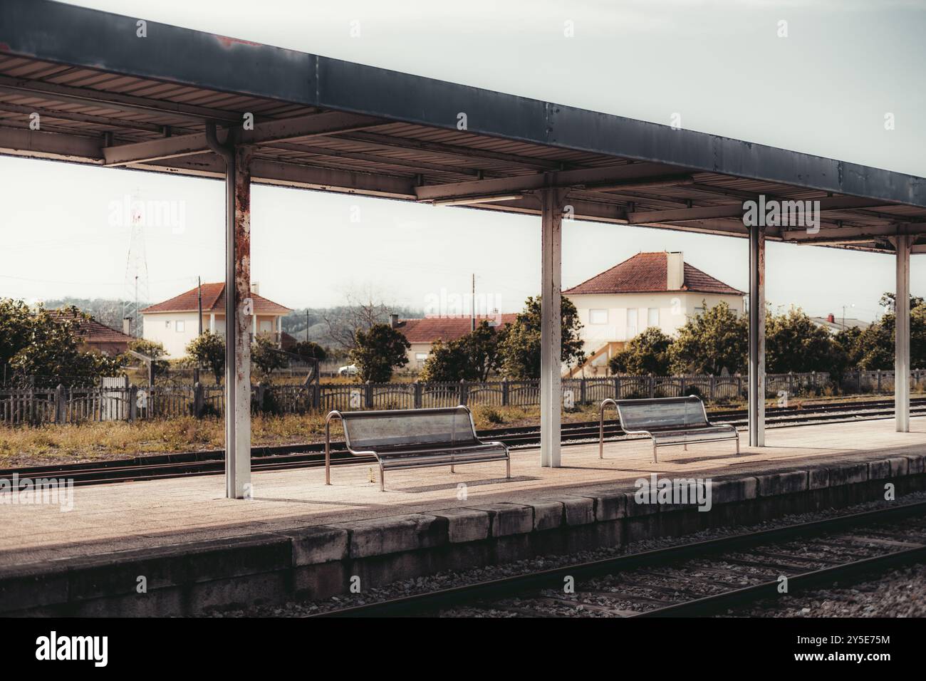 Village train station bench hi-res stock photography and images - Alamy