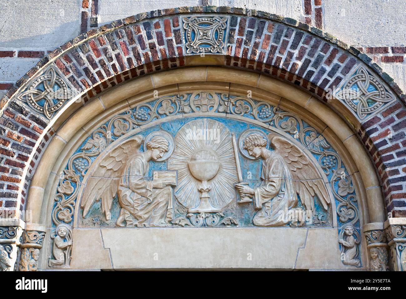 Ornate arch over church door Stock Photo - Alamy