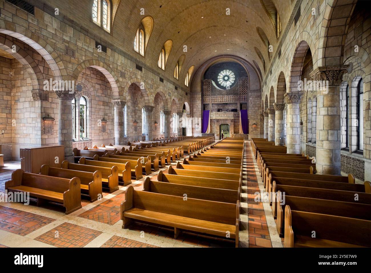Main nave of chapel looking toward back and rose window Stock Photo - Alamy