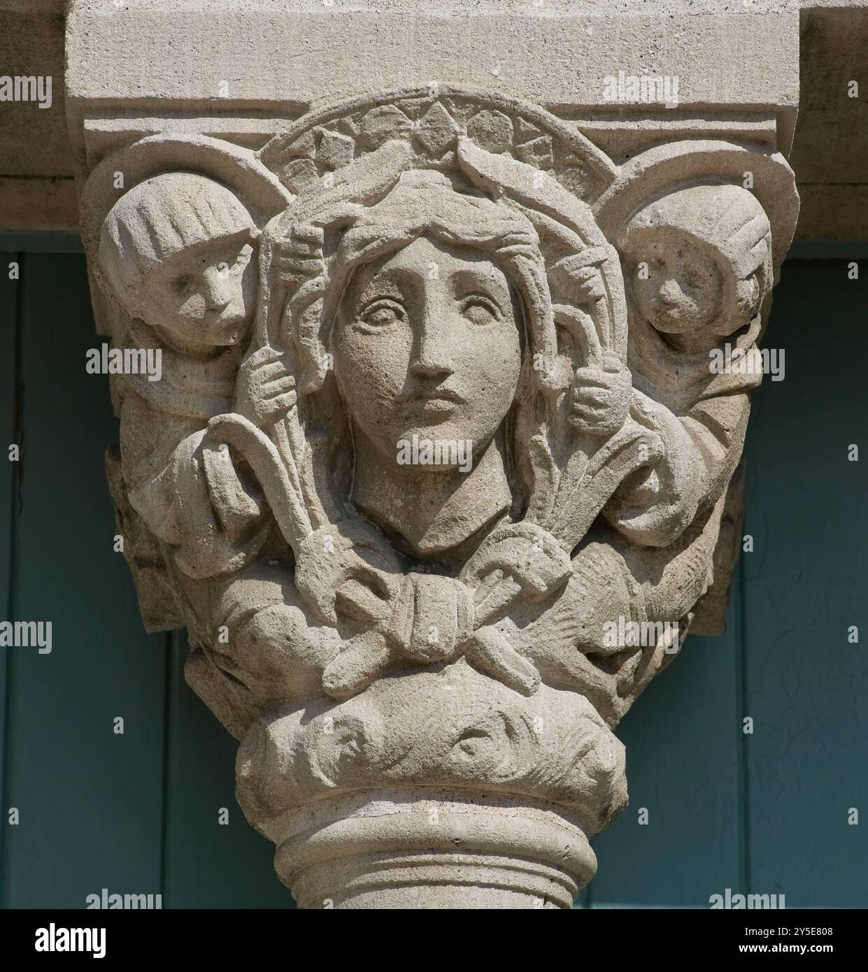 Stone carving of head of St. Victoria on column of church Stock Photo ...