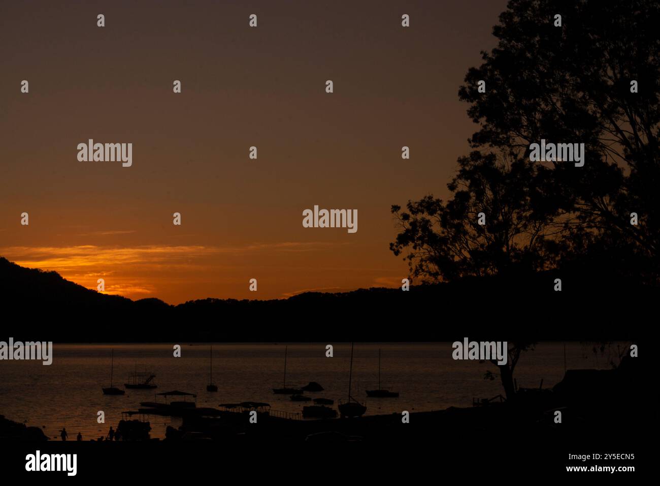 Lakeside Serenity: A Stunning Sunset Stock Photo - Alamy
