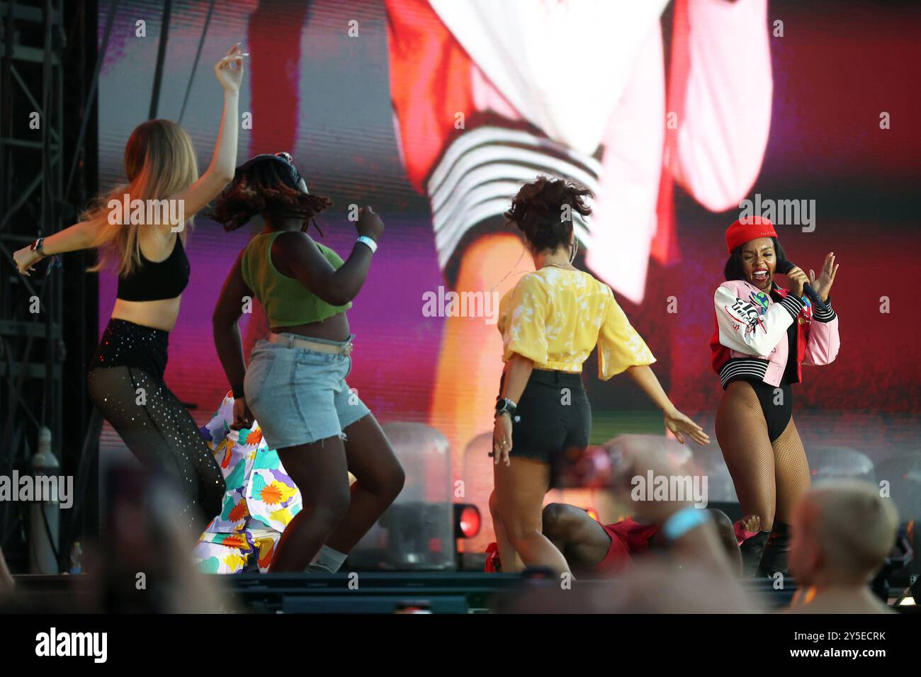 American soul and RnB singer Janelle Monáe performs with fans dancing ...