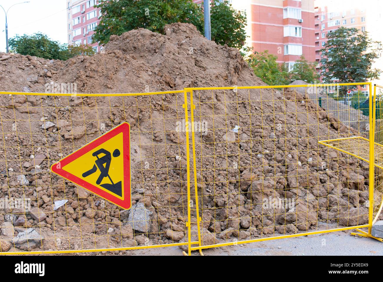 sewage hole water construction sign trench heap ground drainage ...