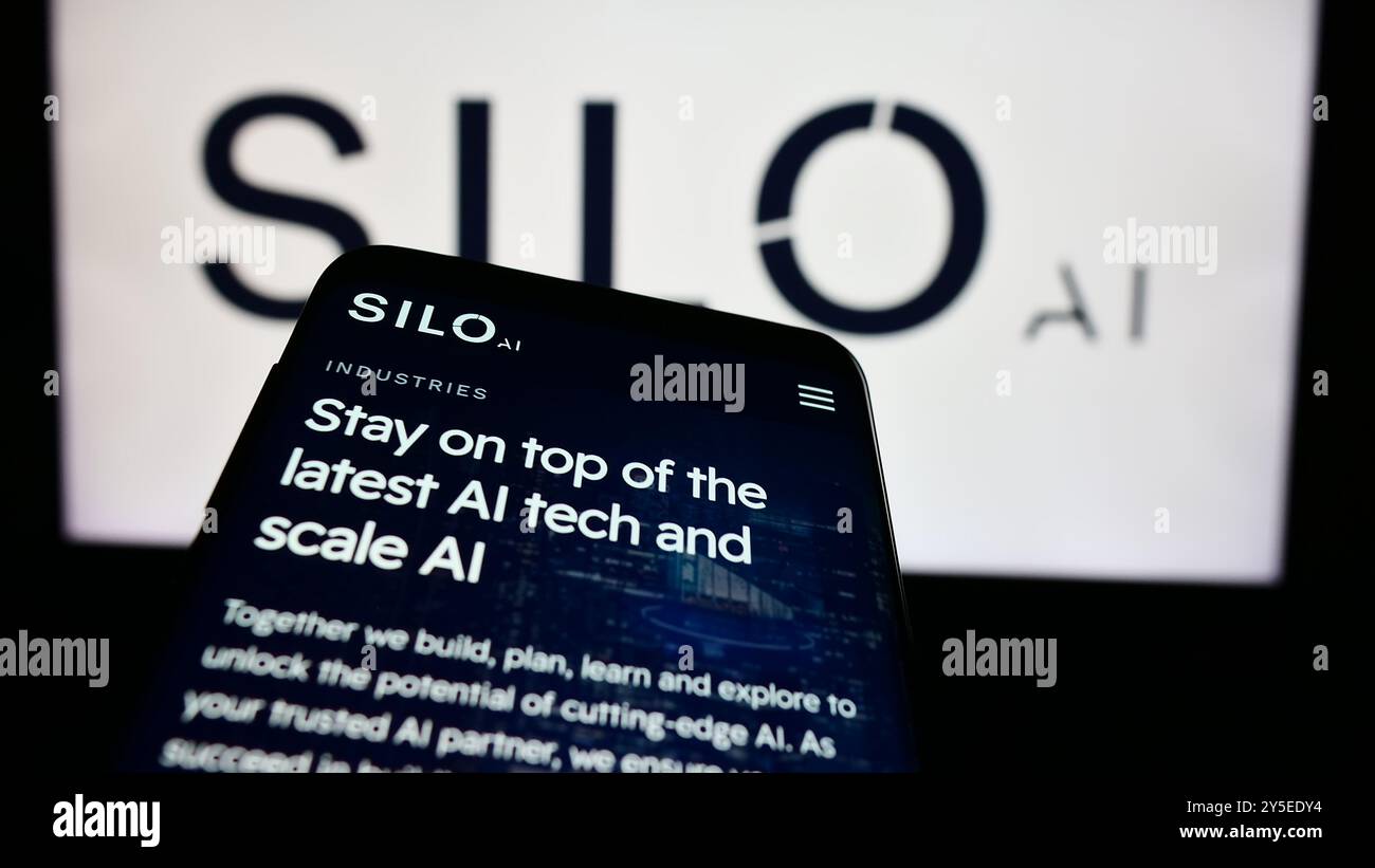 In this photo illustration, a mobile phone with the website of Finnish ...