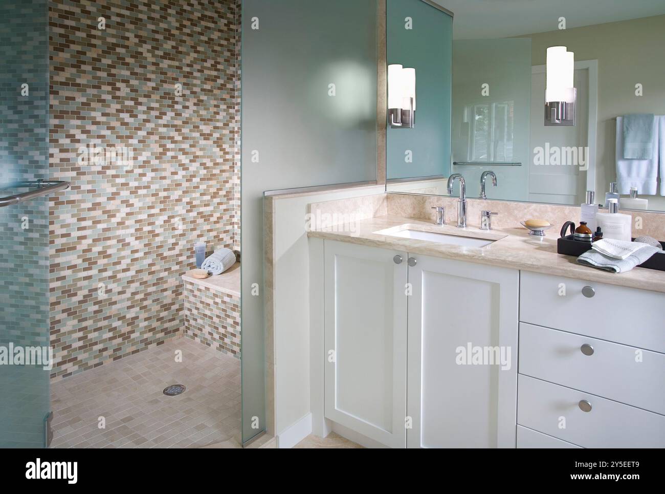 Modern Bathroom with multi-colored tile walk-in shower Stock Photo - Alamy
