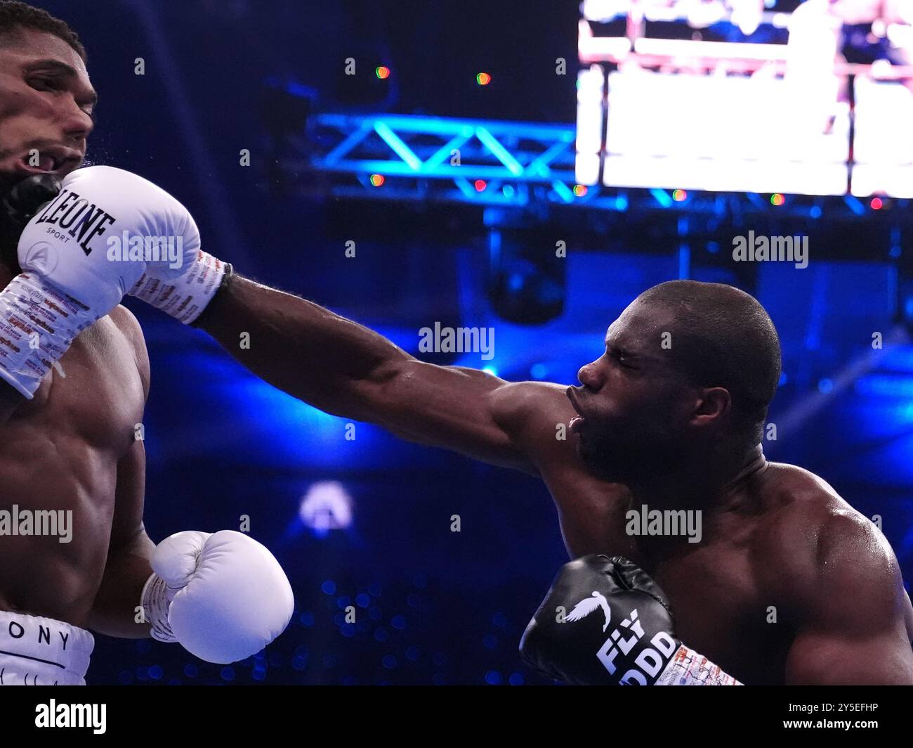 Daniel Dubois (right) lands a blow on Anthony Joshua in the IBF World ...