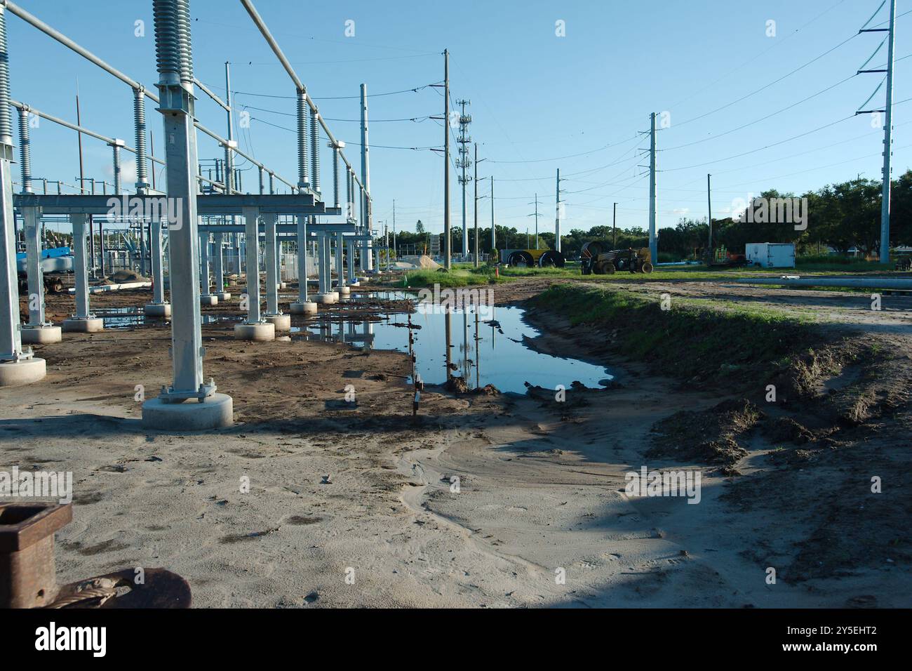 Wide view of the Electric substation under construction. Dirt piles ...