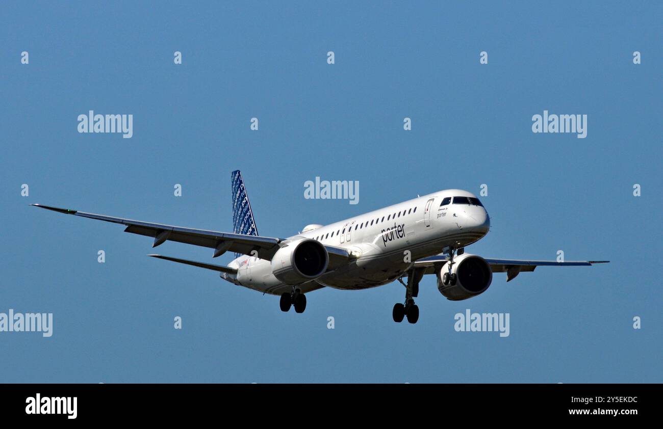 An Embraer E195-E2 operated by Porter Airlines prepares to land at ...