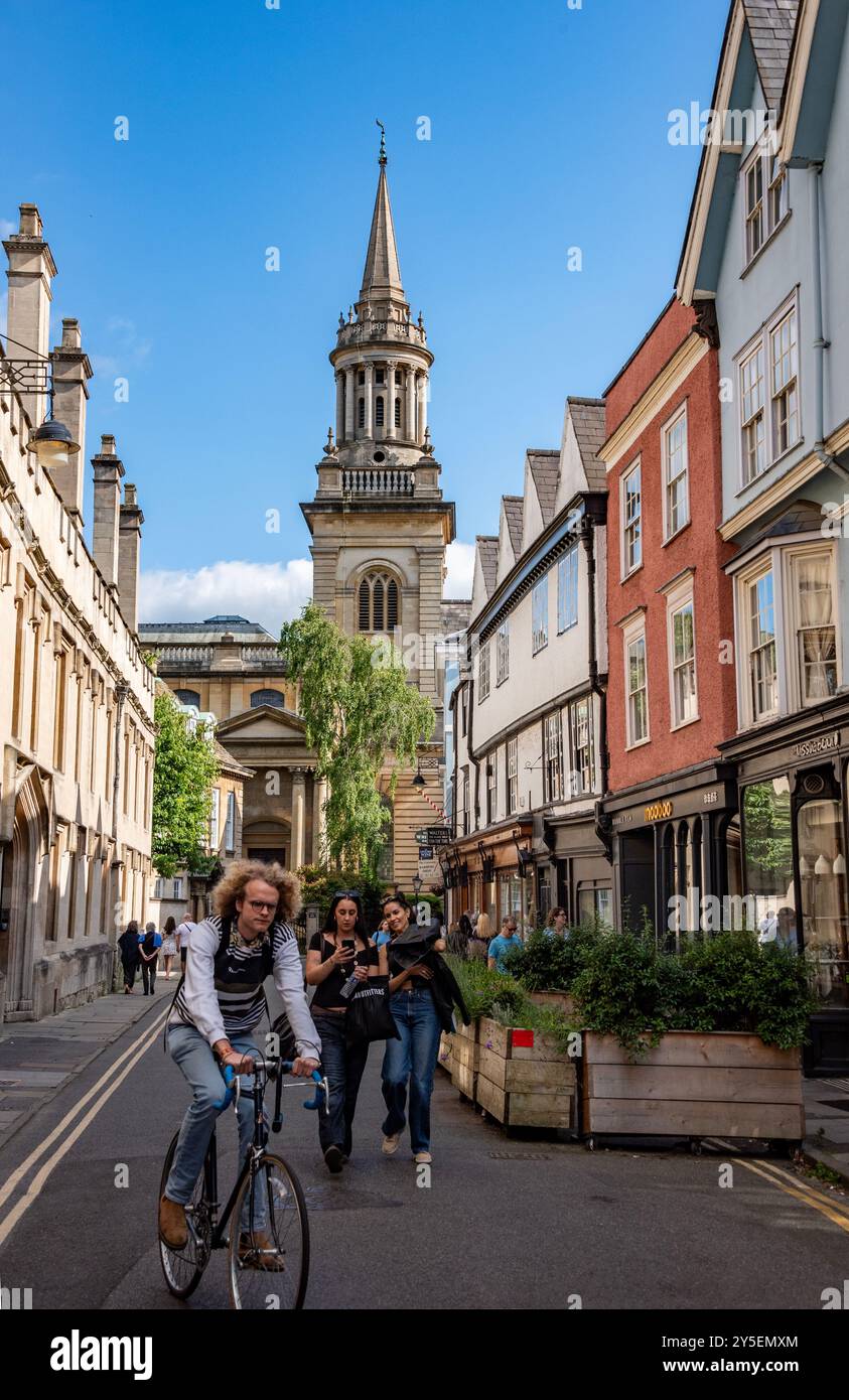 Street scene in Turl Street, Oxford, UK. The spire of Lincoln College ...
