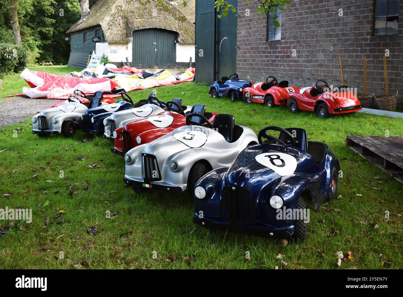 Beesd, the Netherlands - September 13, 2024: a lineup of Austin J40 ...
