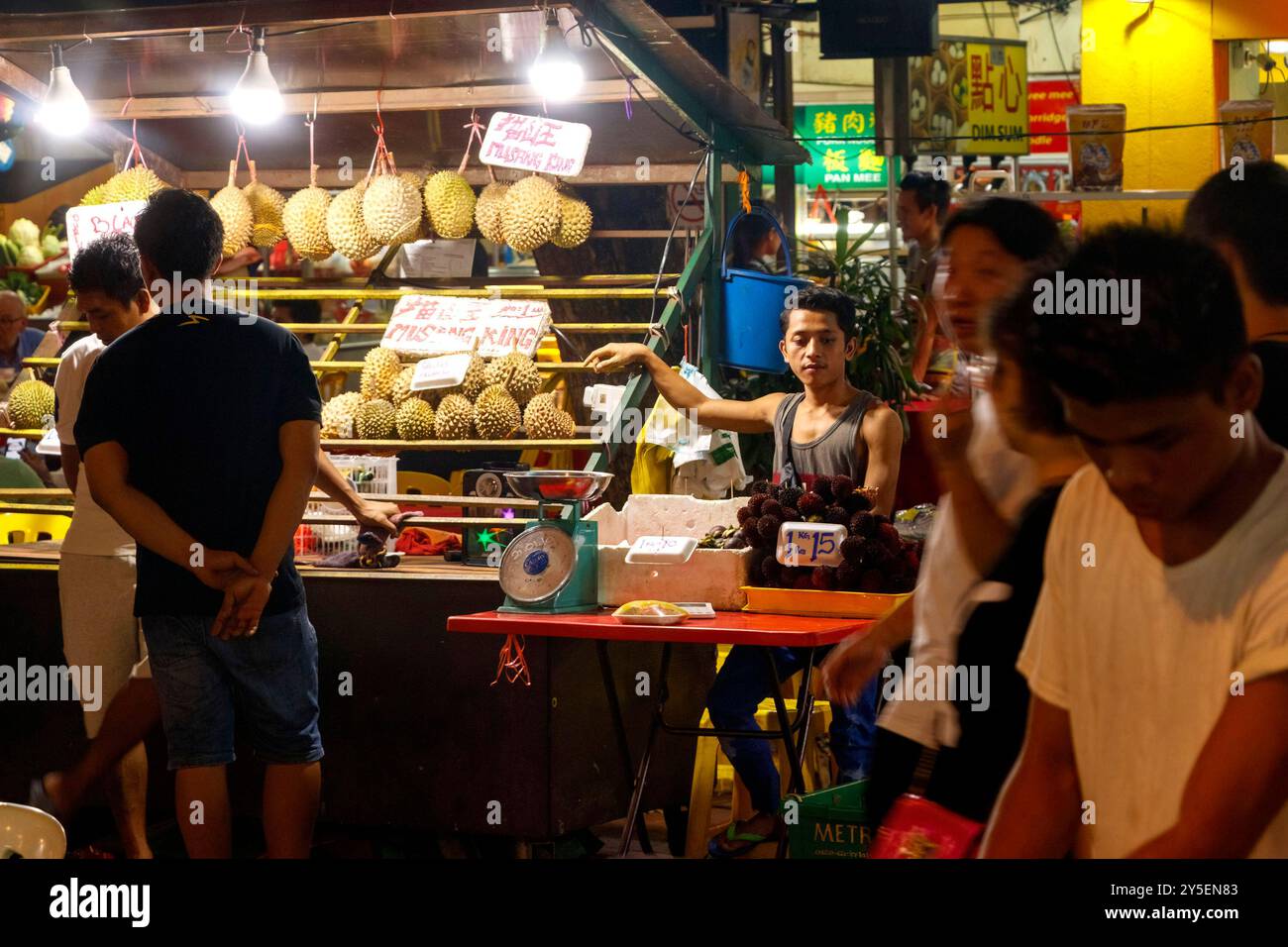 stall selling musang king durian in street food and market at night in ...