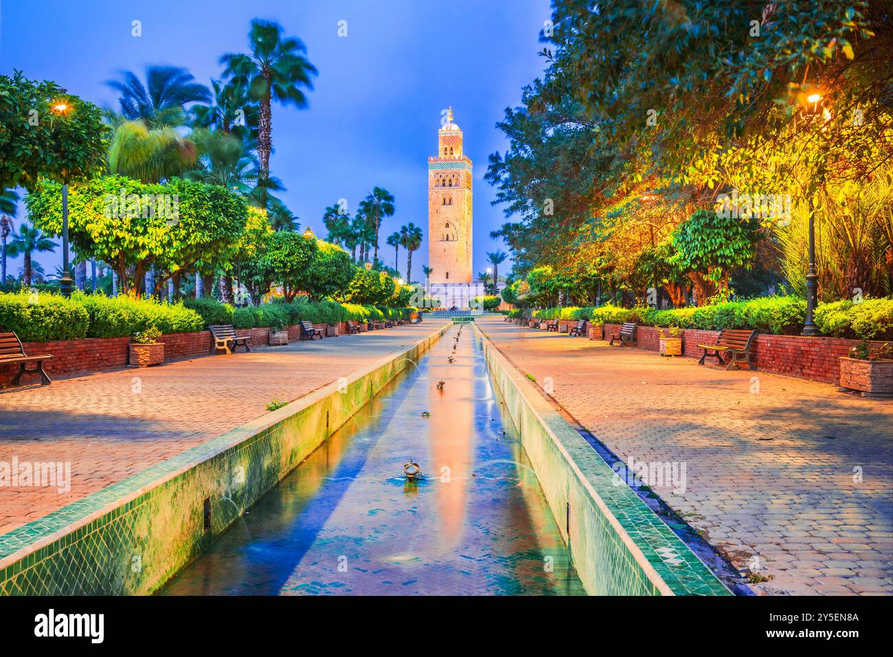 Majestic Koutoubia Mosque with its towering minaret at sunset in ...