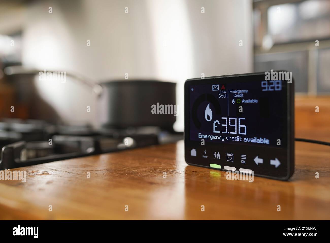 A pay as you go home smart meter on a kitchen worktop displaying low ...