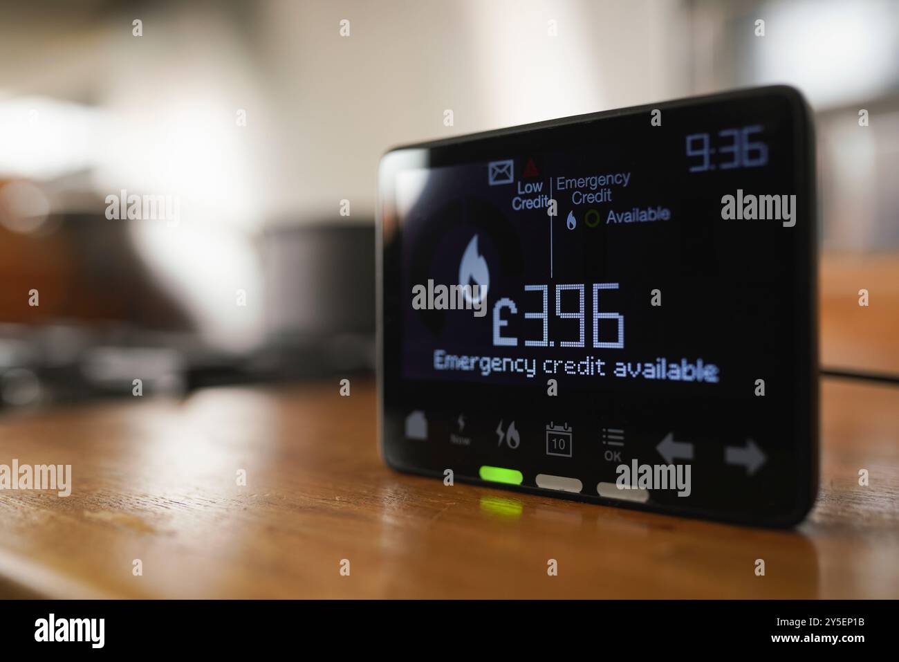 A pay as you go home smart meter on a kitchen worktop displaying low ...