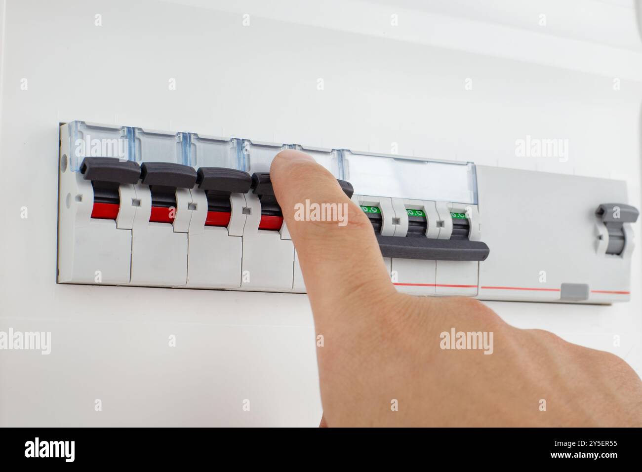 Hand Switching Off Electrical Circuit Breaker Stock Photo - Alamy