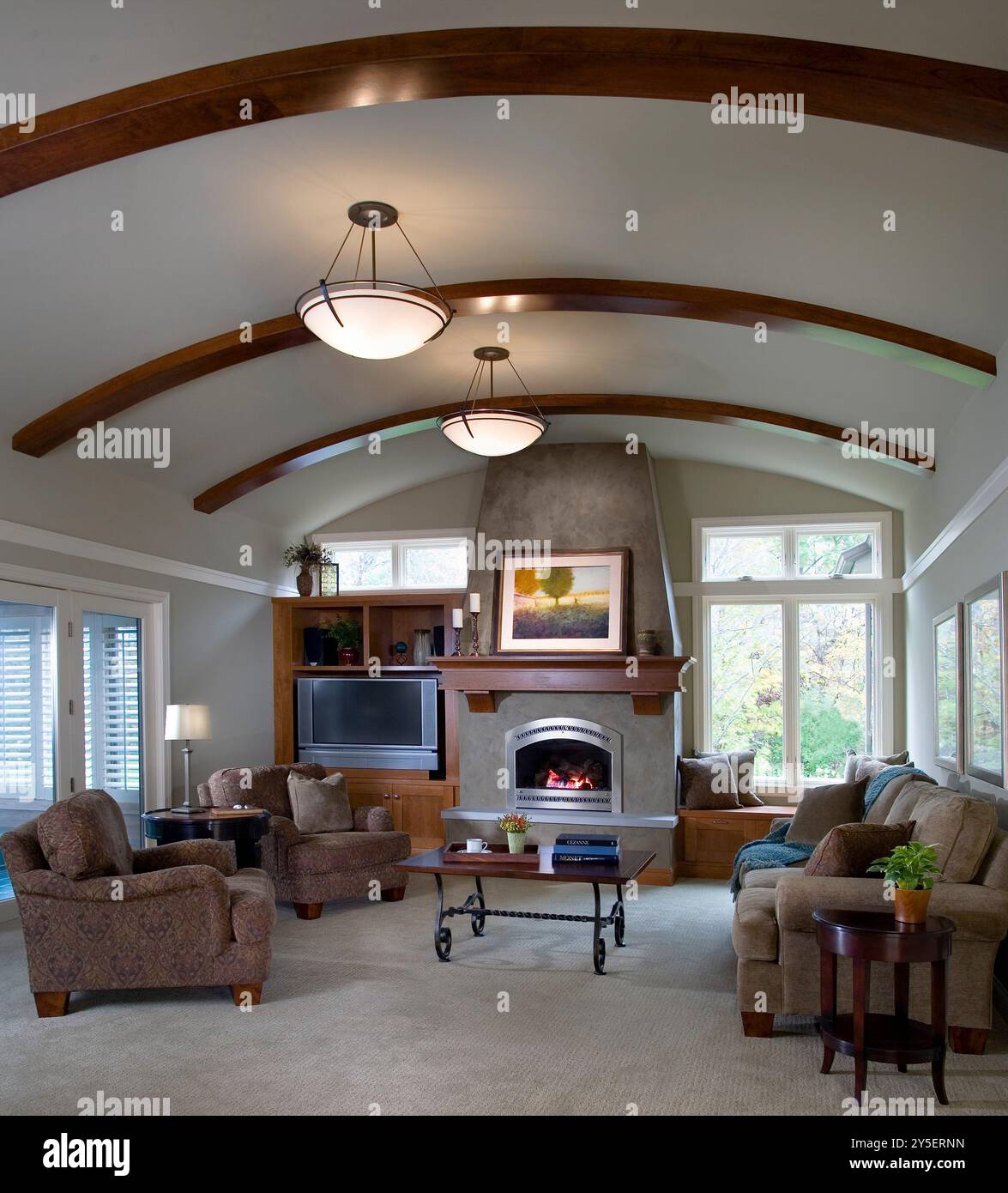 Living room with fireplace and coved beamed ceiling Stock Photo - Alamy