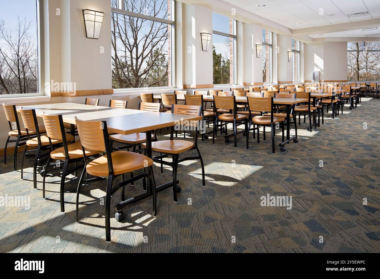 Tables and chairs in university student cafeteria Stock Photo - Alamy