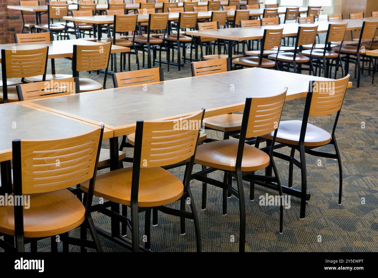 Lots of tables and chairs in large dining area Stock Photo - Alamy