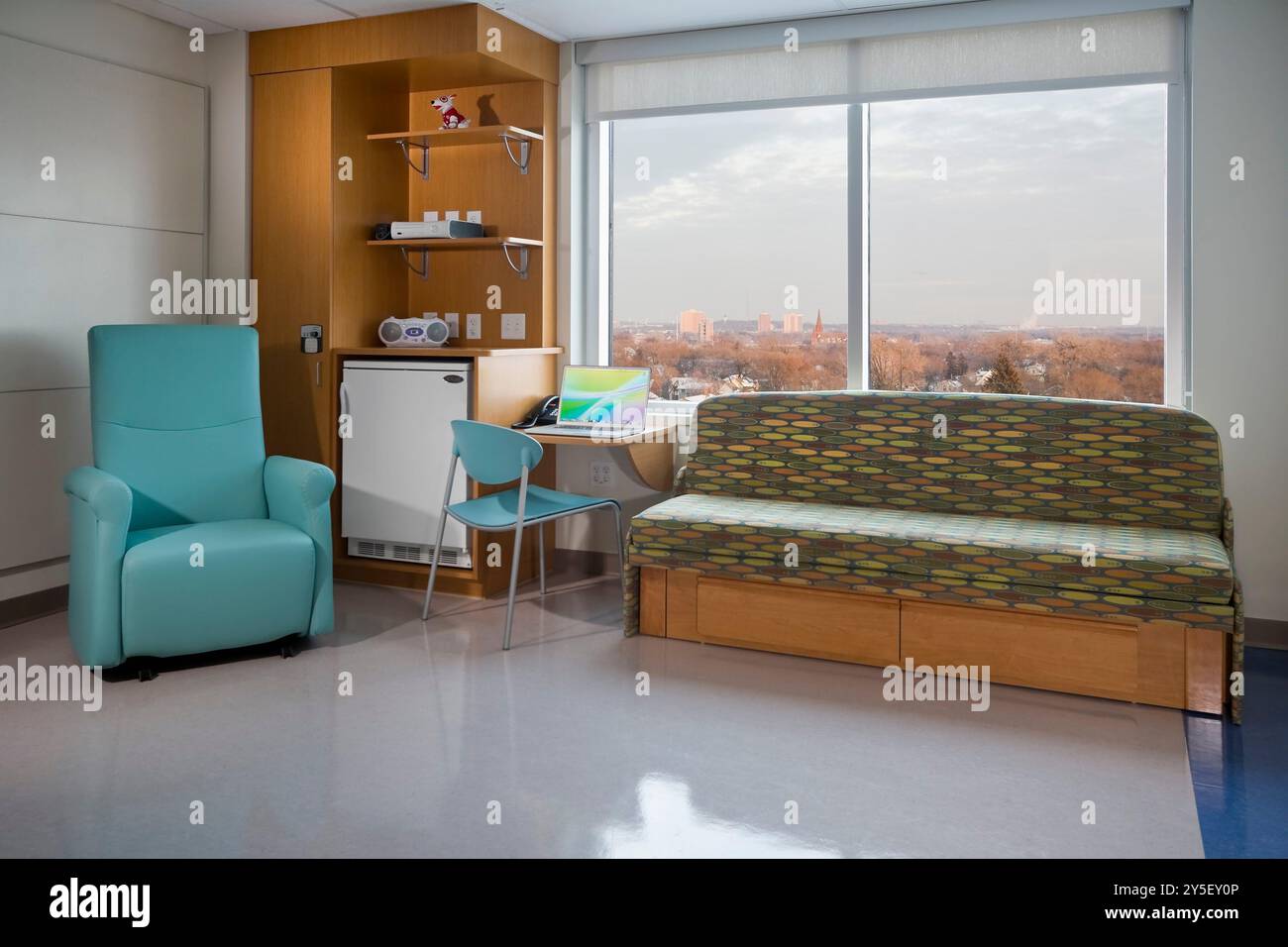 Hospital bed folds back to couch with colorful upholstery hi-res stock ...