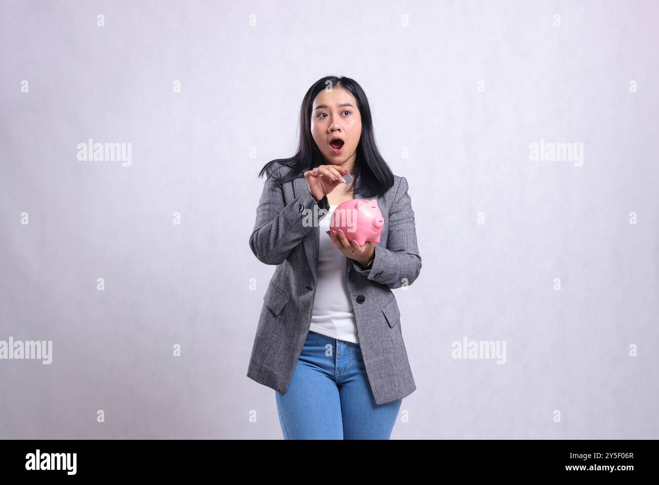 portrait of beautiful adult office lady shocked candid carrying money ...