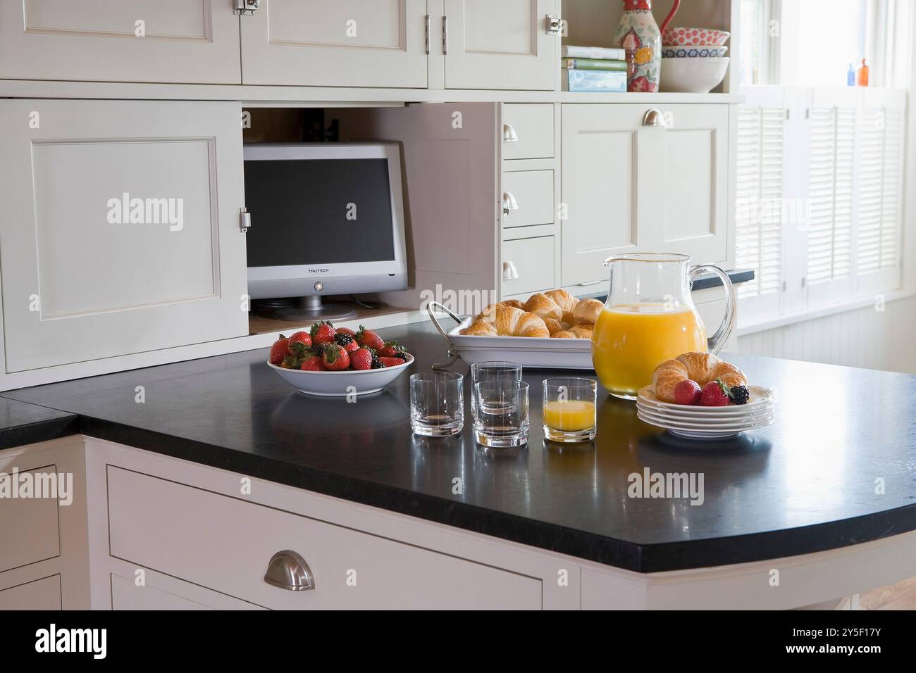 Bright, sunny kitchen with special built-in cabinet for small ...
