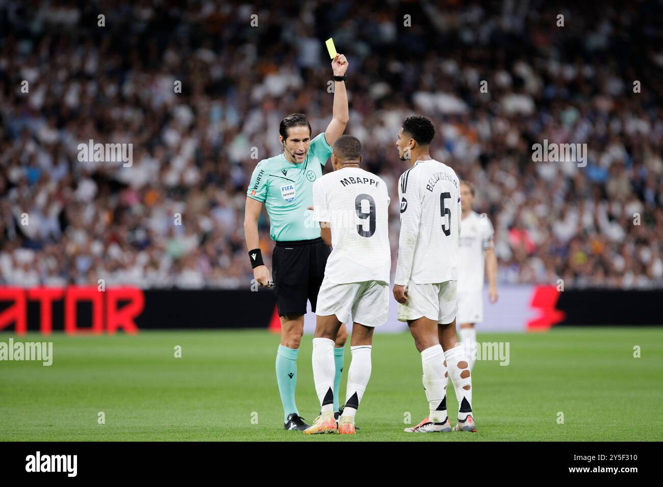 MADRID, SPAIN - SEPTEMBER 21: Kylian Mbappe of Real Madrid receive a ...